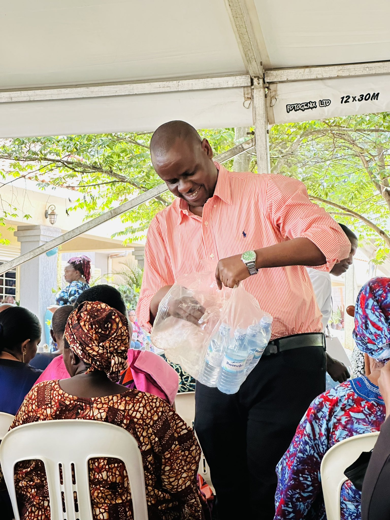Minister Serves Water at Funeral, Honoring Late Dr. Joshua Musinguzi's ...