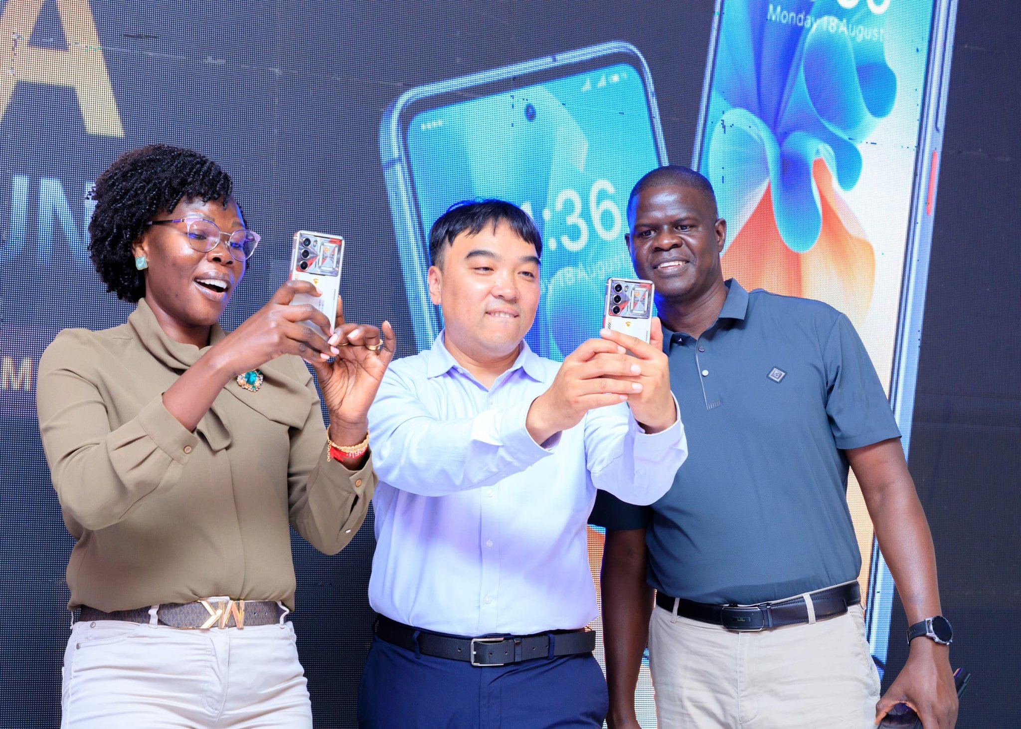 Minister Anite launches SIMI’s Mecha Smart phone - UG Standard - Latest ...